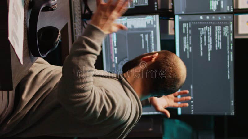 Vertical Video: Young Programmer Typing Server Code on Multiple Monitors Stock Footage - Video ...