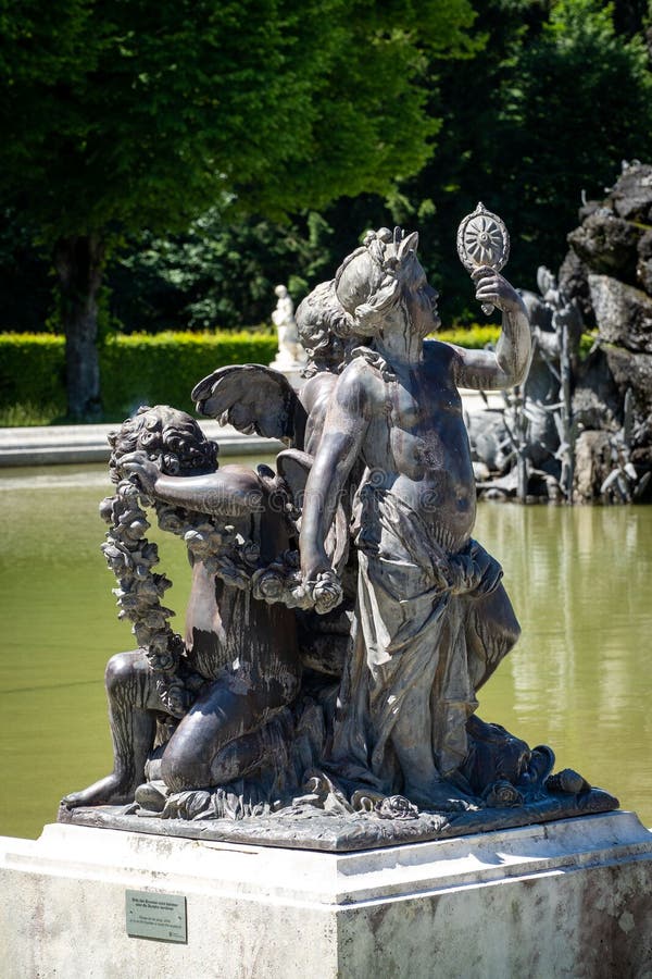 Vertical View of Angels Statue Decorating the Pond on a Sunny Day ...