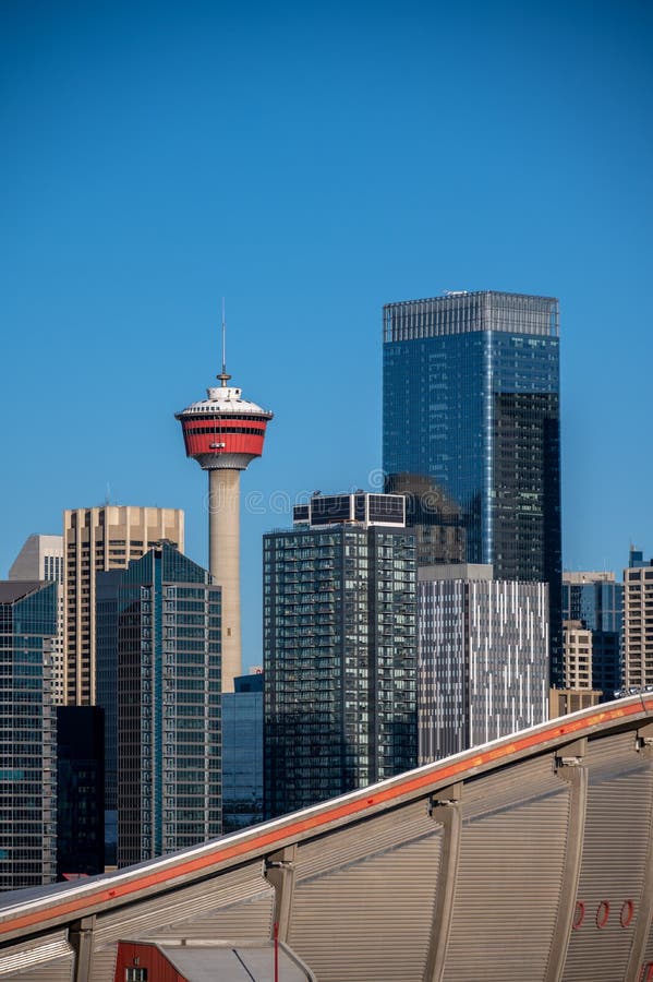 Vertical View of the Calgary Tower with Modern Skyscrapers Under the ...