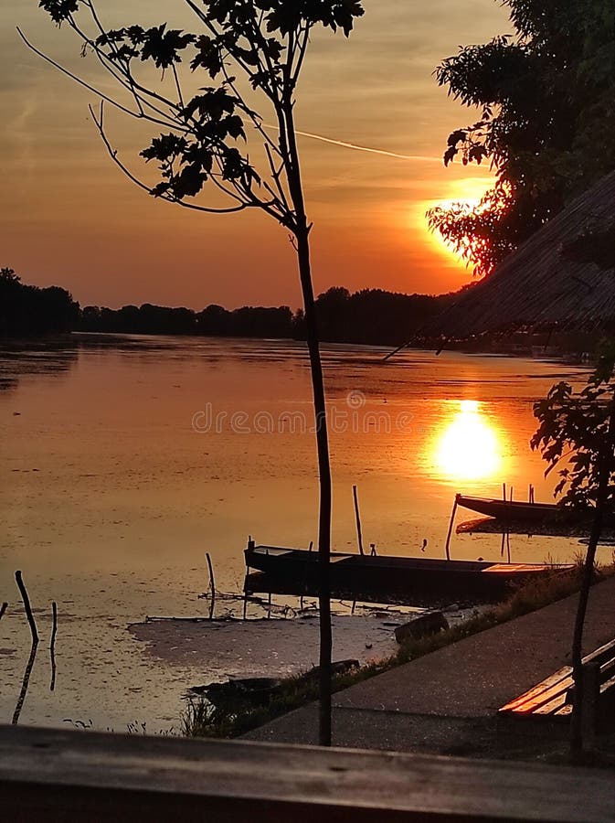 Vertical View of a Calm Lake Reflecting the Sunset Sky Stock Image ...