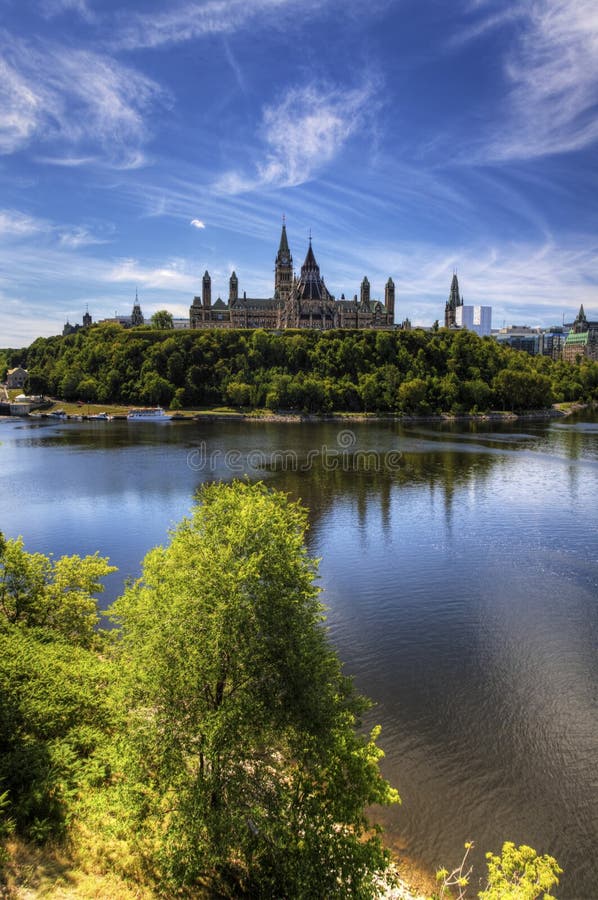 Vertical View of Canada S Parliament by the Ottawa River Stock Photo ...