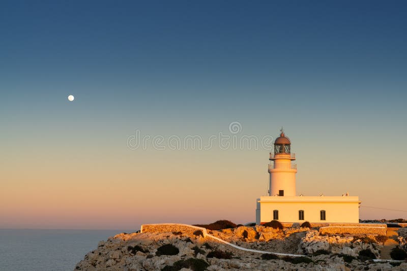 Vertical View of the Cap De Cavalleria Lighthouse on Menorca at Sunset ...