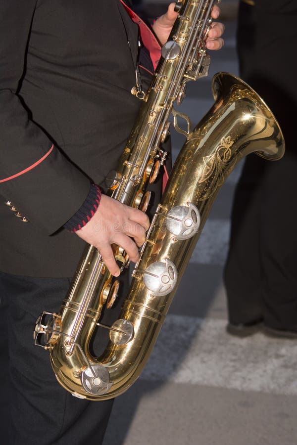 Vertical View of Close Up of Musician Playing Saxophone in Black Stock ...
