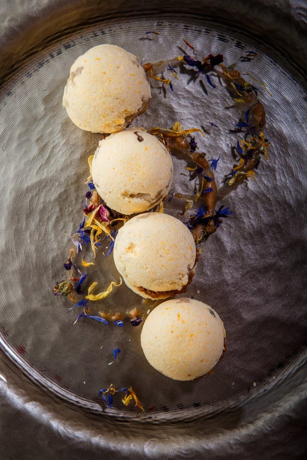 Closeup Four Sphere Shaped Candies Form White and Black Chocolate Stock ...