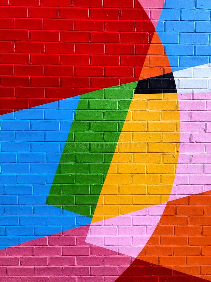 Vertical View of a Colorful Abstract Shapes on a Brick Wall Stock ...