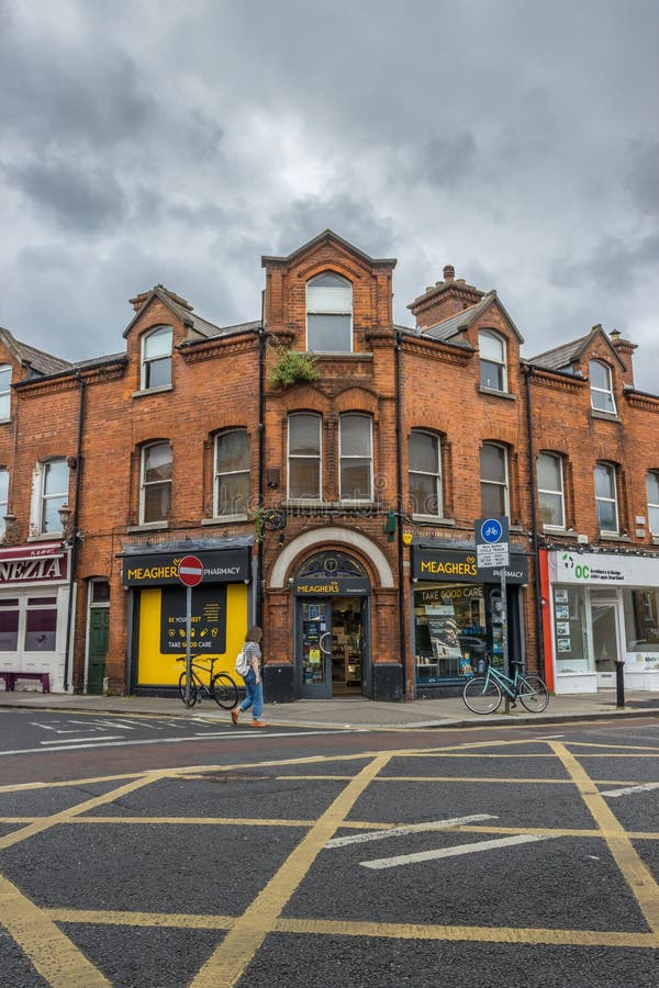 Vertical View of Dublin City Street Side Corner Building with Shops ...