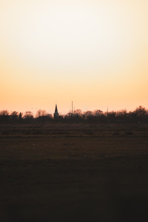 Vertical View of a Field during Sunset Hours Stock Image - Image of ...