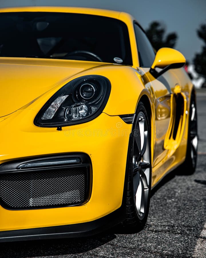 Vertical View of the Front of a Mesmerizing Yellow Porsche Cayman ...