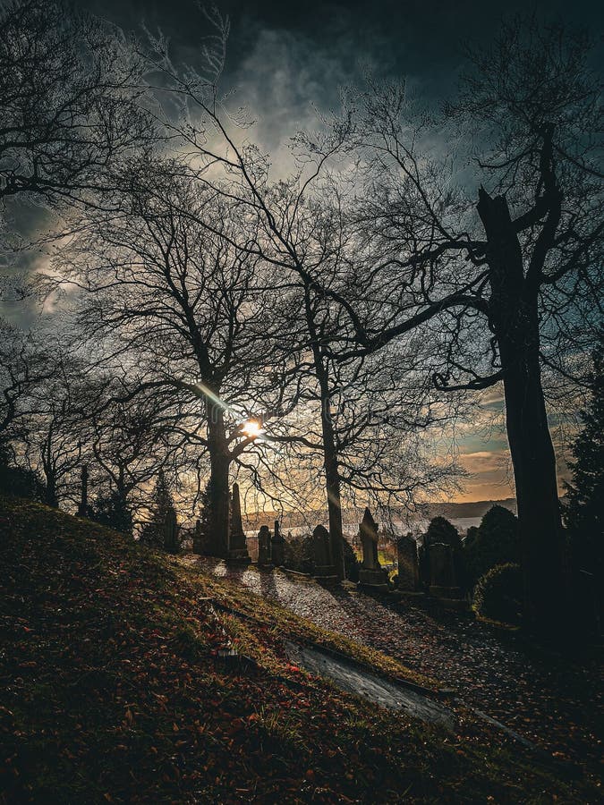 Vertical View of a Graveyard on a Gloomy Day at Sunset Stock Image ...