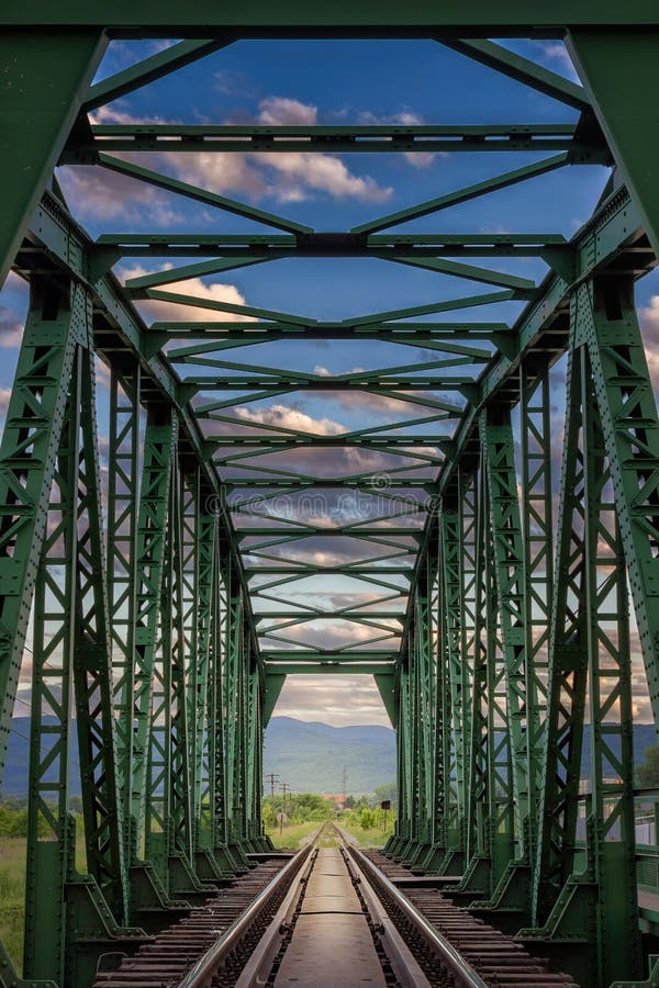 Vertical View through Old, Iron, Railway Bridge during Sunset Stock ...