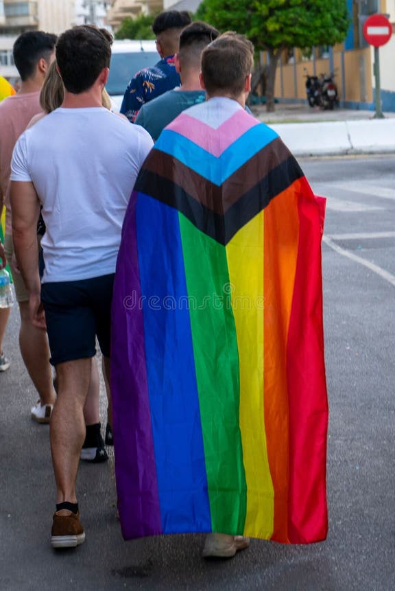 Vertical View of People Participating in the Gay Parade with Flags ...