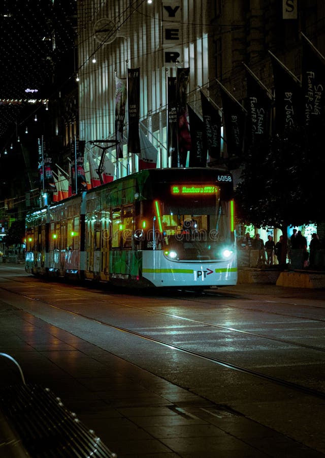 Vertical View of a Public Bus at Night in Melbourne S Central Business ...