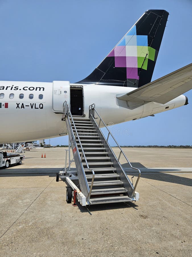 Vertical View of the Rear of an Airplane with Its Boarding Ladder ...