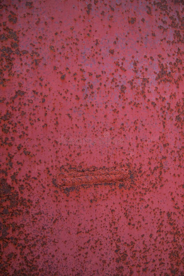 Vertical View of a Red Grungy Textured Surface Creates an Uneven ...