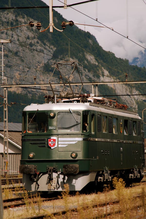 Vertical View of an SBB Ae 6 and 6 Train with People in it and a ...