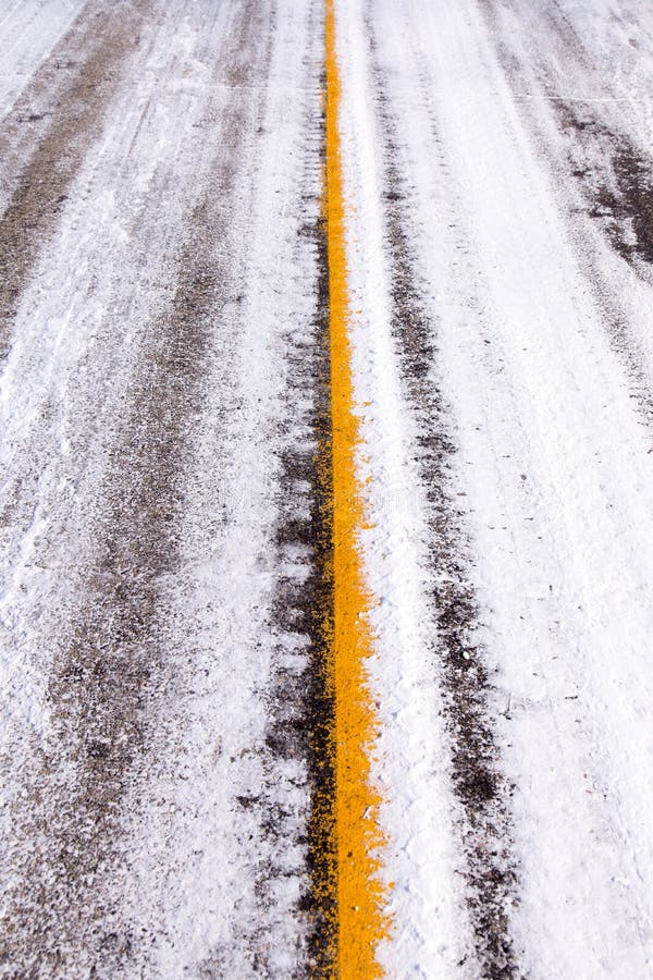 Vertical View of Single Solid Yellow Line in the Middle of a Road ...
