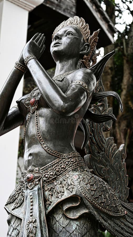 Vertical View of a Statue of the Buddhist Mythology Character Kinnaree ...