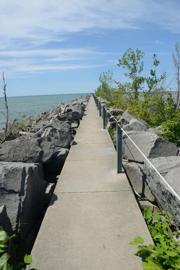 Vertical View of a Stone Pathway Leading To the Endless Ocean Under the ...