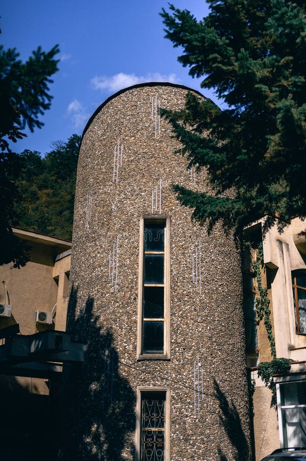 Cylindrical Building with Pebble Exterior Under Clear Sky Stock Photo ...