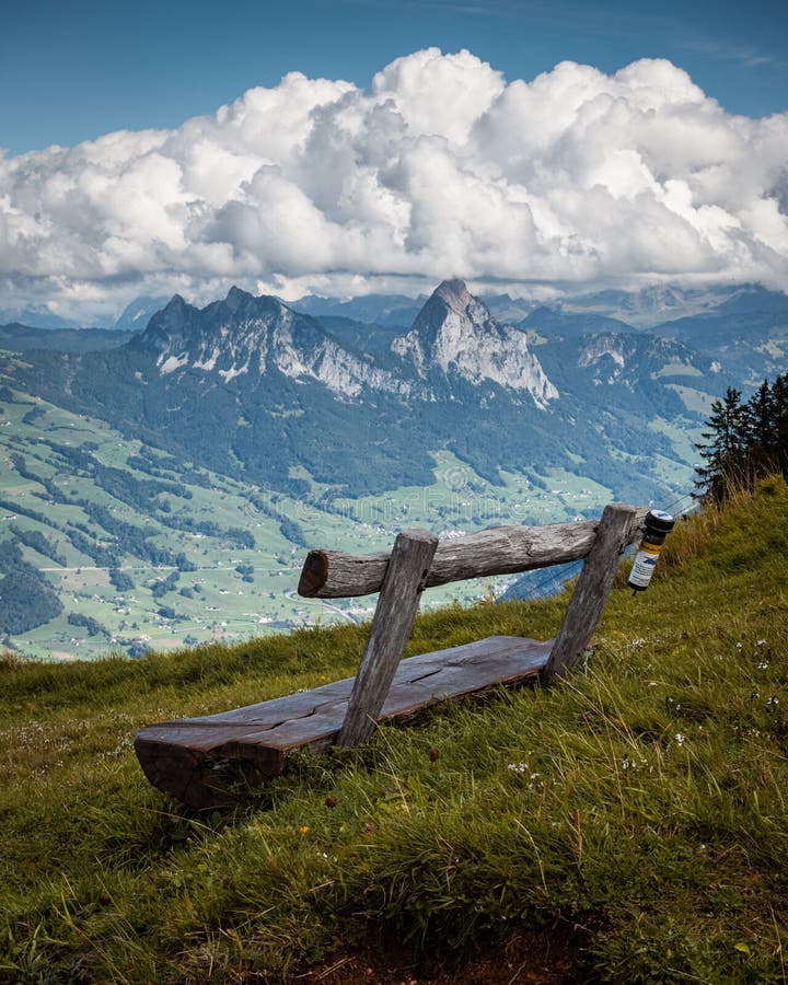 Vertical View of a Wooden Bench on a Slope Facing the Scenic View of ...