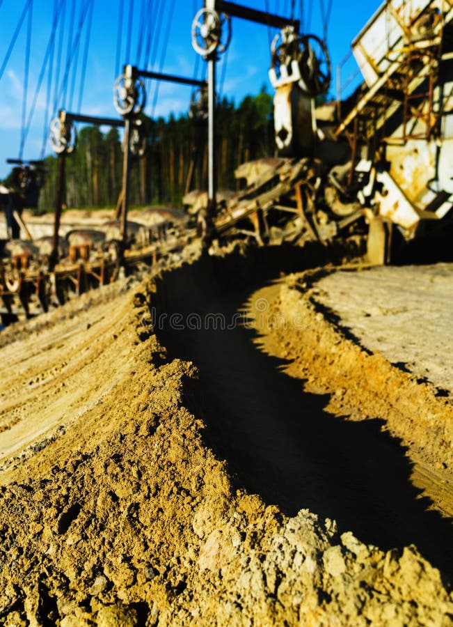 Vertical Vivid Sand Mining Machine Stock Photo - Image of format ...