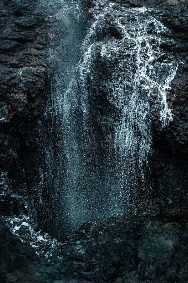 Vertical of a Water Splash in a Scenic Sea Stock Photo - Image of ...