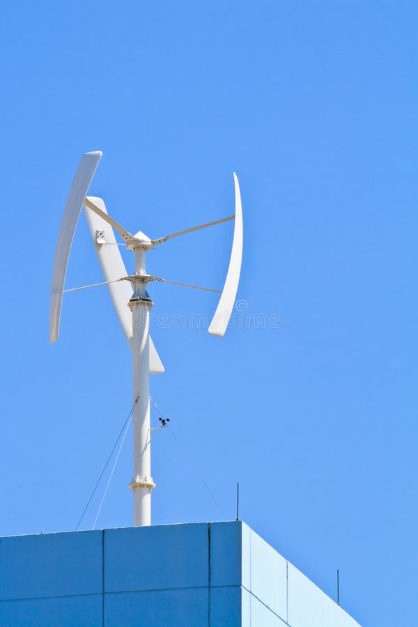 Vertical Wind Turbine On The Top Of Building Royalty Free Stock Image ...