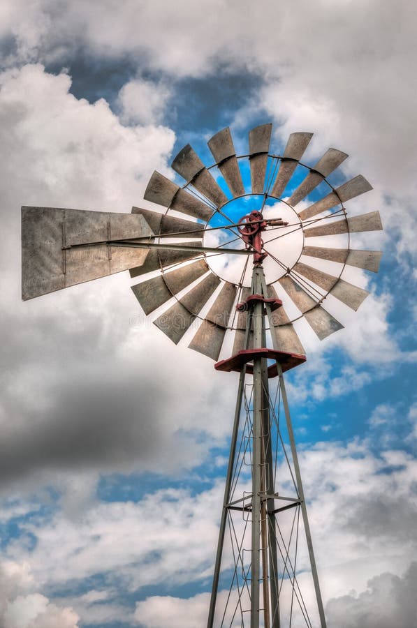 Vertical Windmill Top Against Clouds Stock Photo - Image of windmill ...
