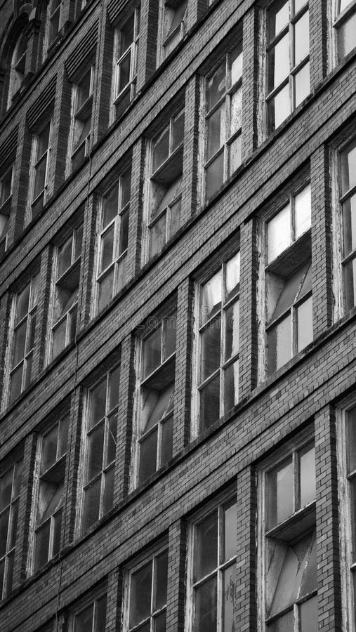 Vertical of a Windows on a Brick Building of a Factory Shot in ...