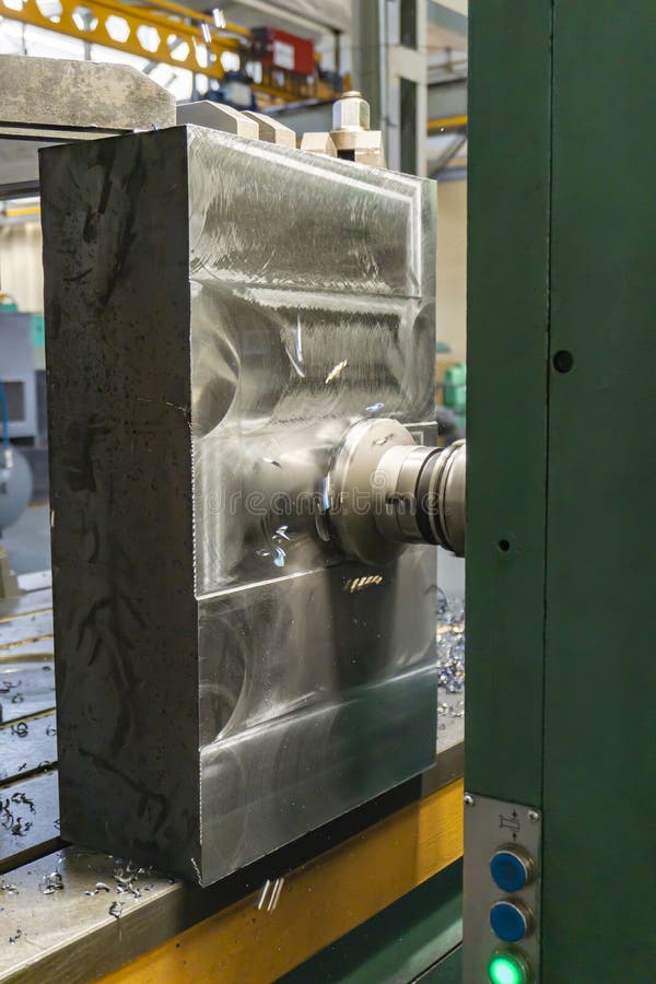 A Vertically Milling Machine with a Cnc Router Performs Grinding of a ...