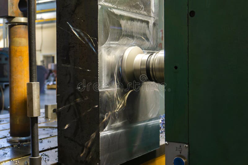 A Vertically Milling Machine with a Cnc Router Performs Grinding of a ...