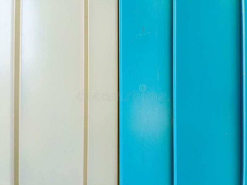 A Vertically Oriented Blue and White Metal Plate Background with Light ...