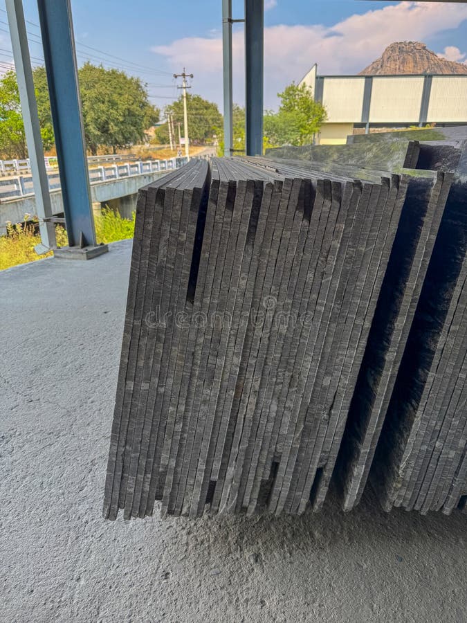 Vertically Stacked Granite Slabs in a Factory Stock Photo - Image of ...