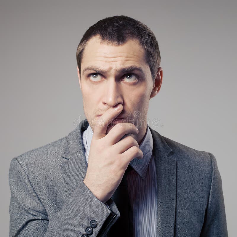 Verwarde Zakenman on Gray Background Stock Foto - Image of bureau ...