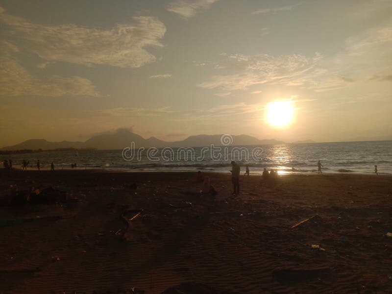 A Very Amazing View of the Sunset on the Beach Stock Photo - Image of ...