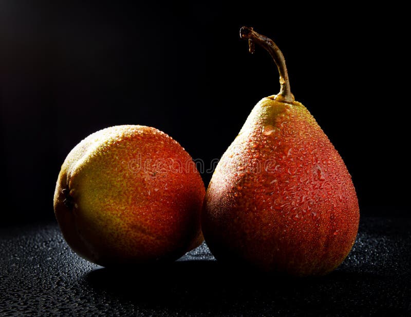 Very Beautiful Ripe Pear on a Black Background Stock Image - Image of ...