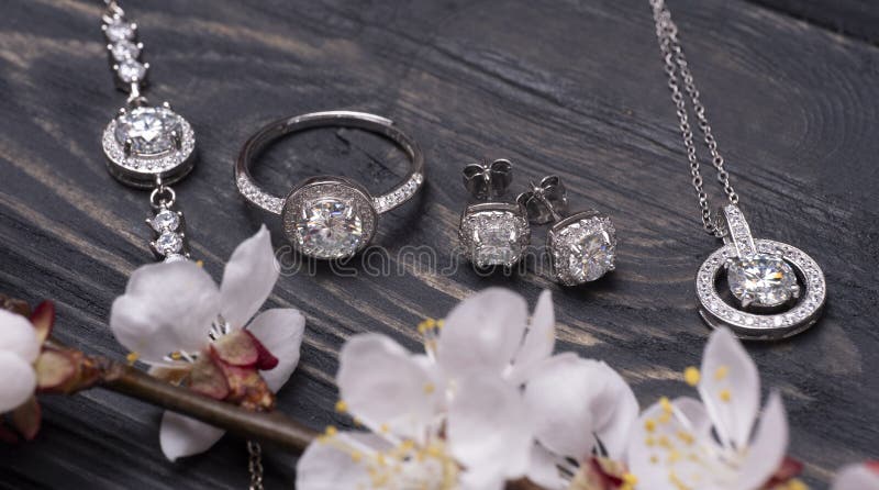 Very Beautiful Silver Set with Diamonds on a Dark Background Stock ...