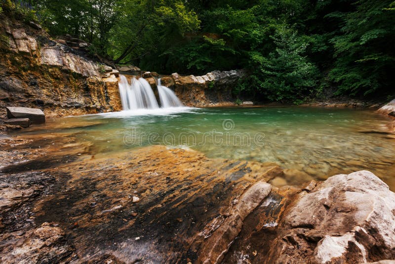 Very Beautiful Spring Waterfall in the Valley of the River Jean in the ...