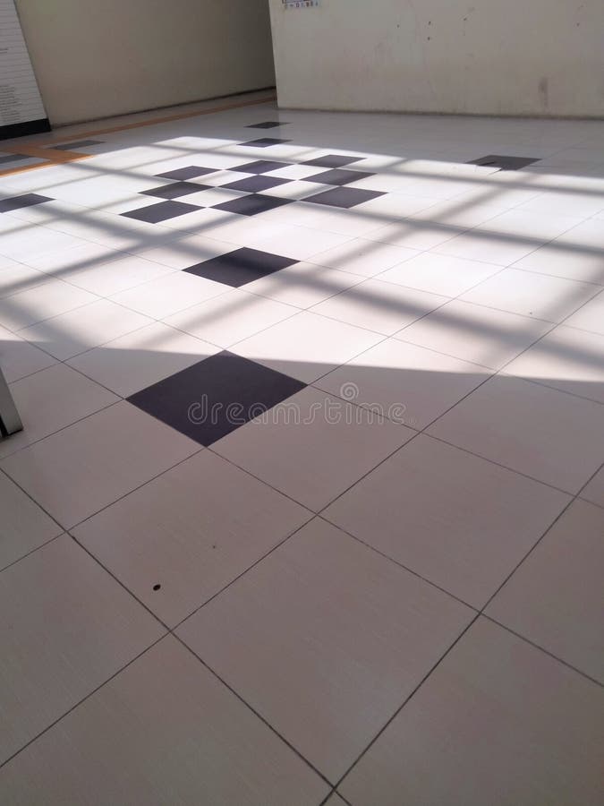 Very Beautiful Square Ceramic Floor with Sunlight Rays Stock Image ...