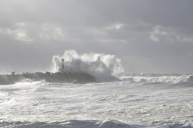 Very Big Wave on a Blocks Jetty Stock Image - Image of beach, grey ...