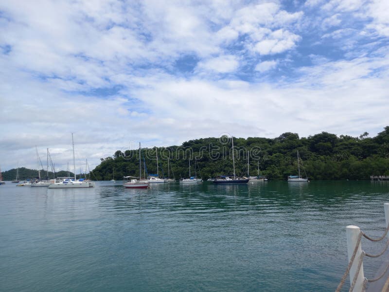 Very Calm Sea Surrounded by Islands Stock Photo - Image of cloud, coast ...