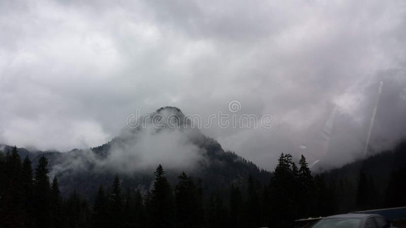 A very cloudy mountain stock image. Image of darkness - 185572363
