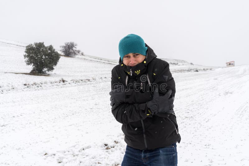 Very Cold Man in the Middle of a Snowfall Stock Photo - Image of nature ...