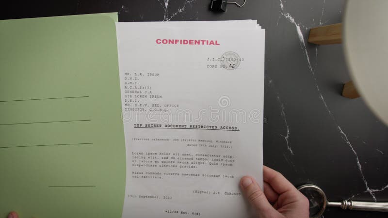 Very Confidential Documents Extracted from a Folder Stock Footage ...