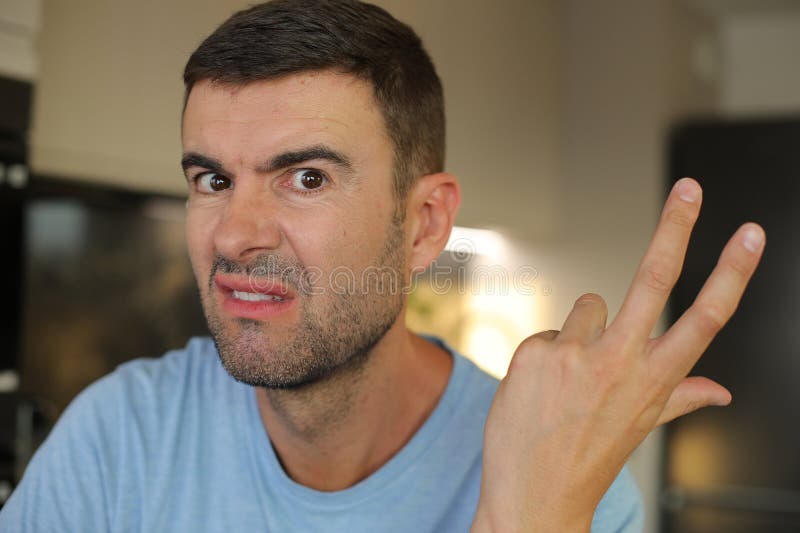 Very Critical Looking Man with a Disapproving Expression Stock Photo ...