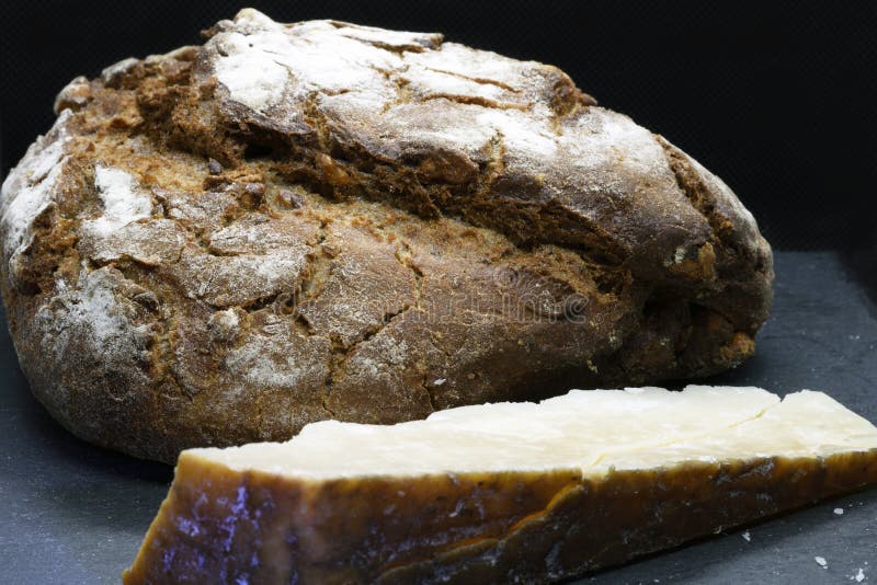 Very Cured Cheese and Loaf of Rustic Bread Stock Photo - Image of fresh ...