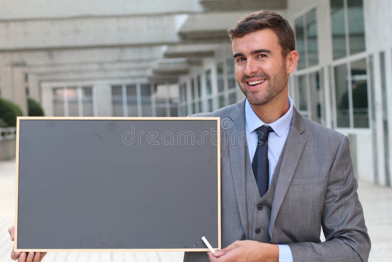 Very Cute Gentleman Holding a Sign Stock Photo - Image of hold, holding ...