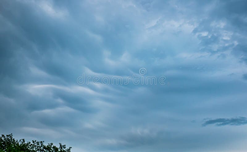 Very Dense Blue Clouds Resembling Snow or Sand Dunes Stock Photo ...