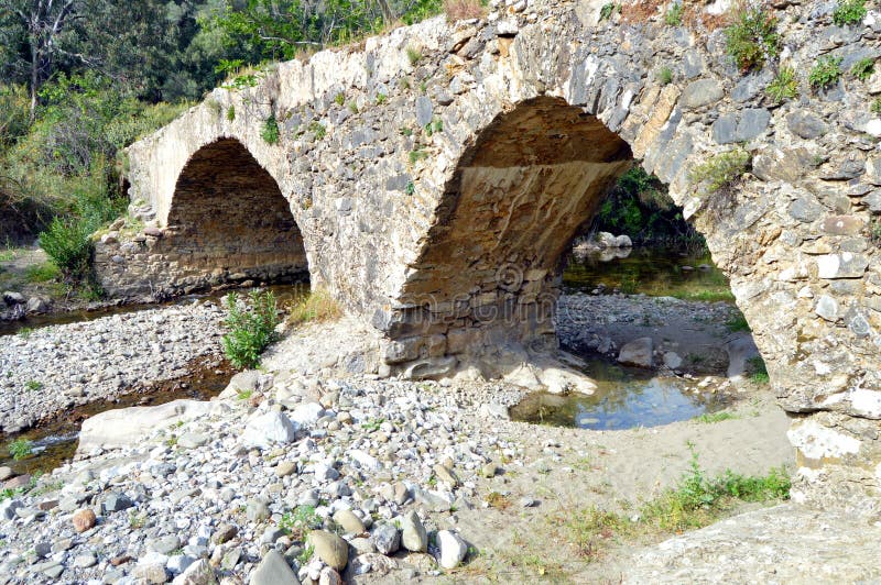 Very Former Bridge in Stones. Stock Photo - Image of landmark, water ...