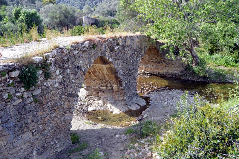 Very Former Bridge in Stones. Stock Photo - Image of landmark, water ...